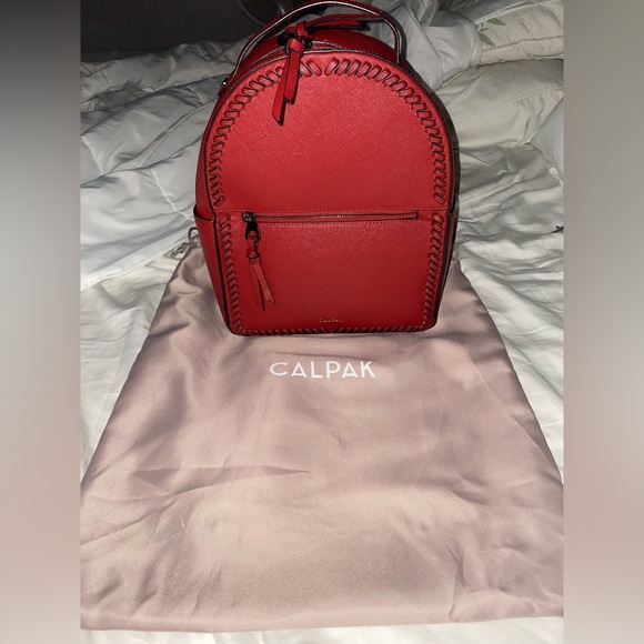 Calpak | Bags | Calpak Kaya Round Backpack Beautiful Red In New ...